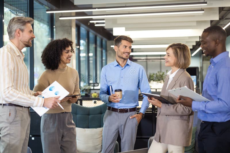 Business Meeting - Manager Discussing Work with His Colleagues. Stock ...