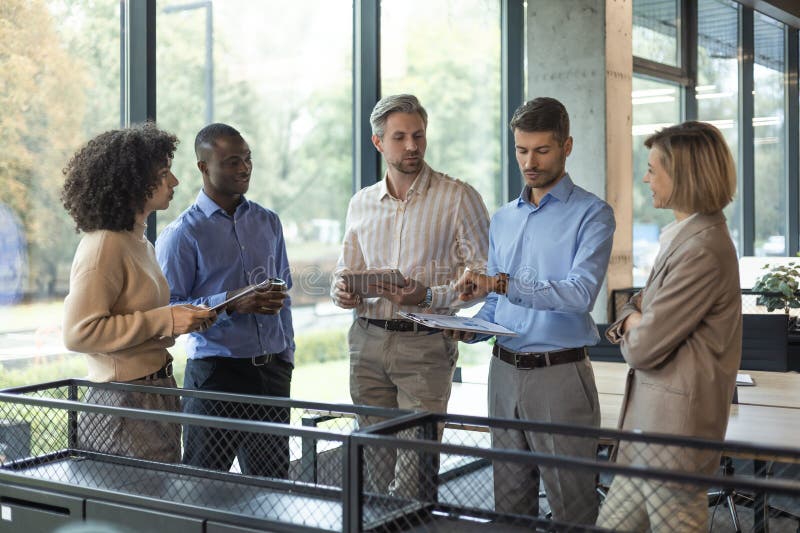 Business Meeting - Manager Discussing Work with His Colleagues. Stock ...