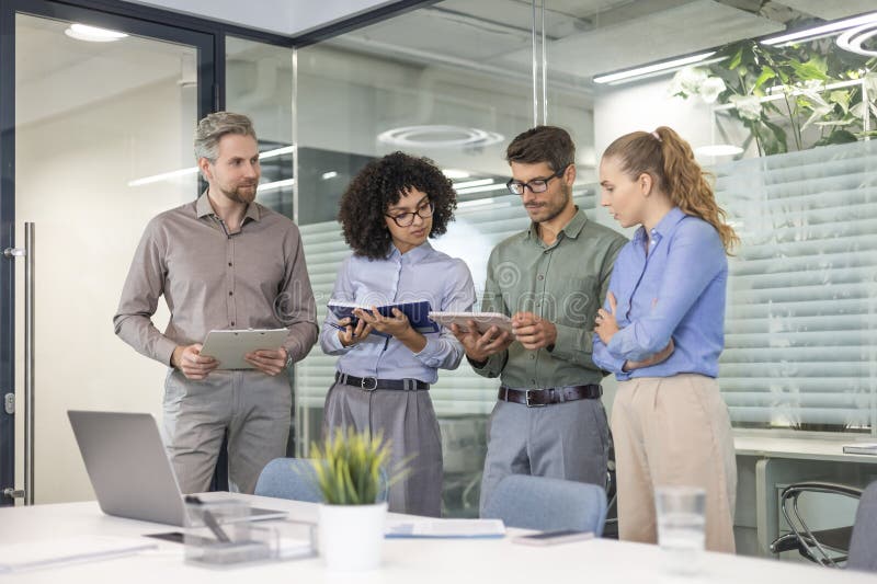 Business Meeting - Manager Discussing Work with His Colleagues. Stock ...