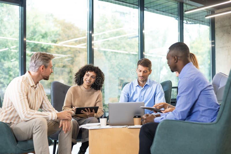Business Meeting - Manager Discussing Work with His Colleagues. Stock ...