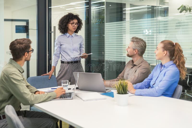 Business Meeting - Manager Discussing Work with His Colleagues. Stock ...