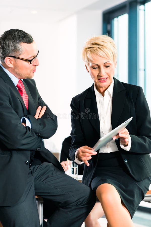 Senior Managers Sitting Down during an Important Interactive Mee Stock ...