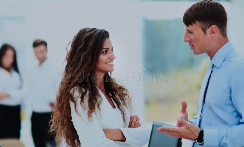 Business - Meeting in Office, Two Managers are Discussing a Docu Stock ...