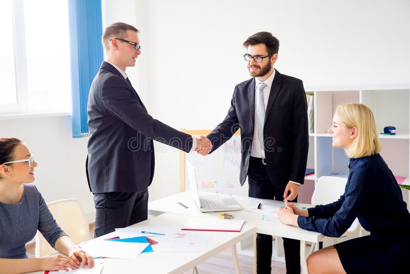 Business Meeting in Progress Stock Image - Image of team, standing ...