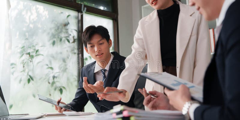Business Meeting and Strategy Development. Team Members Discussing Key ...
