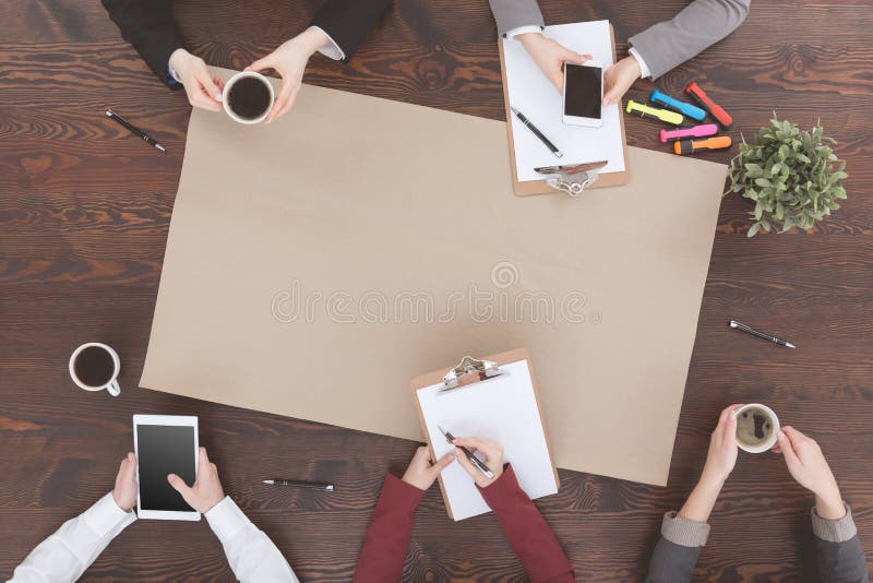 Business Meeting beside Table Stock Image - Image of marker, notepad ...