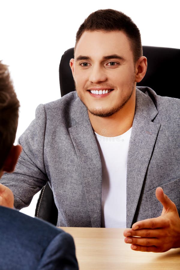 Business Meeting - Two Men Sitting and Talking Stock Photo - Image of ...