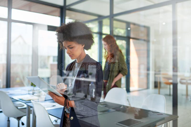 Business Meets Technology. a Young Creative Working on a Digital Tablet ...