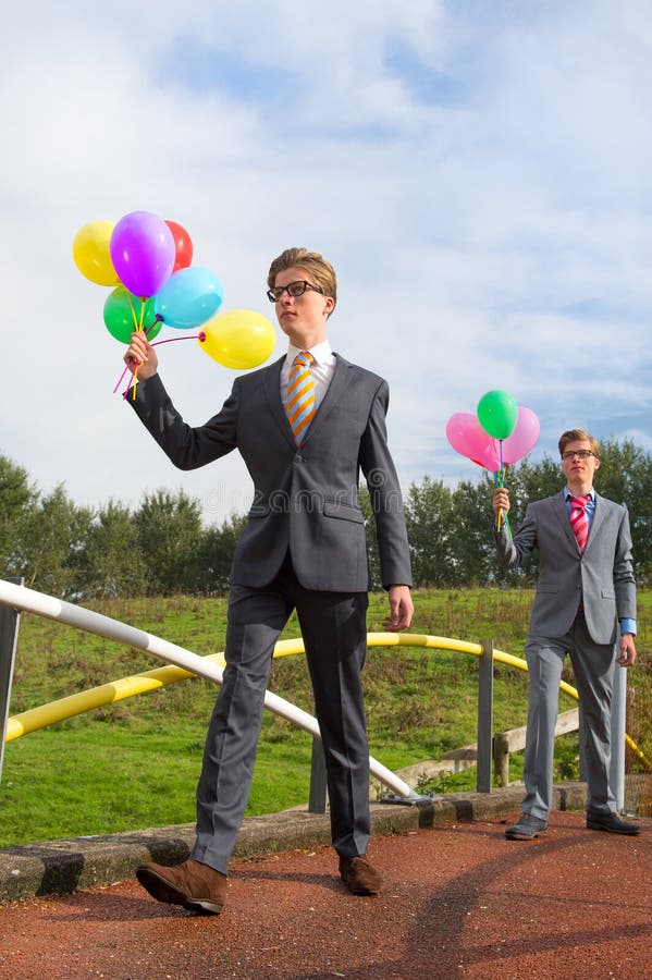 Business men with balloons stock photo. Image of holdong - 34432740