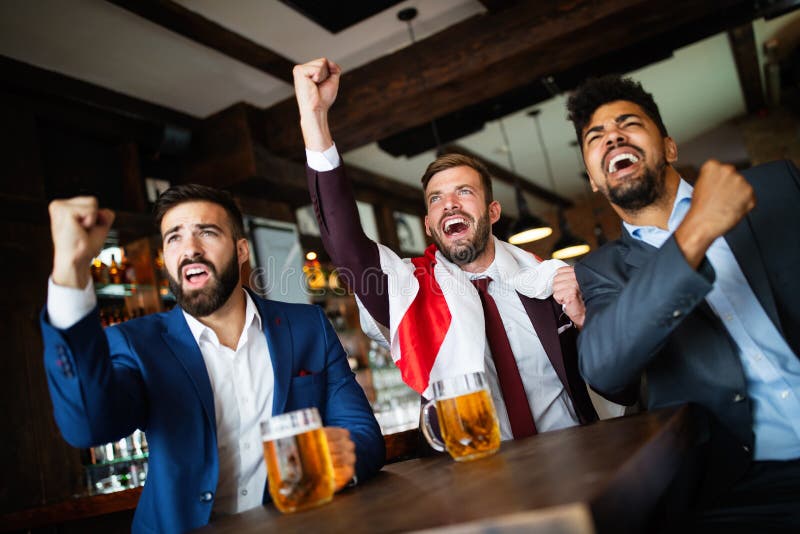 Business Men in Pub Cheering for a Sporting Event Stock Photo - Image ...