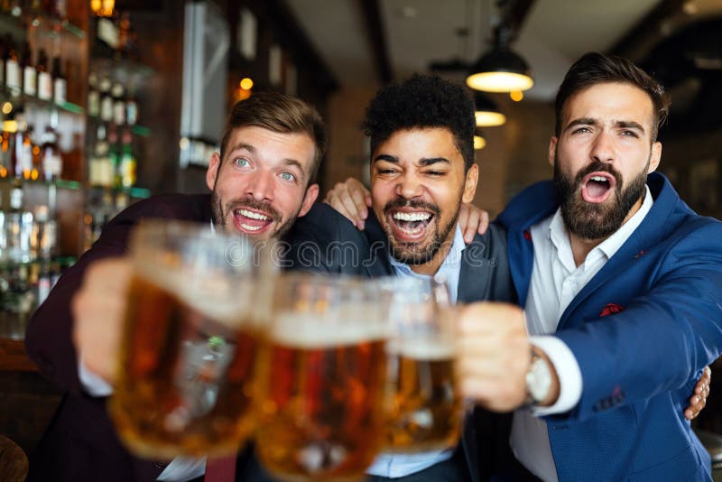 Business Men in Pub Cheering for a Sporting Event Stock Photo - Image ...