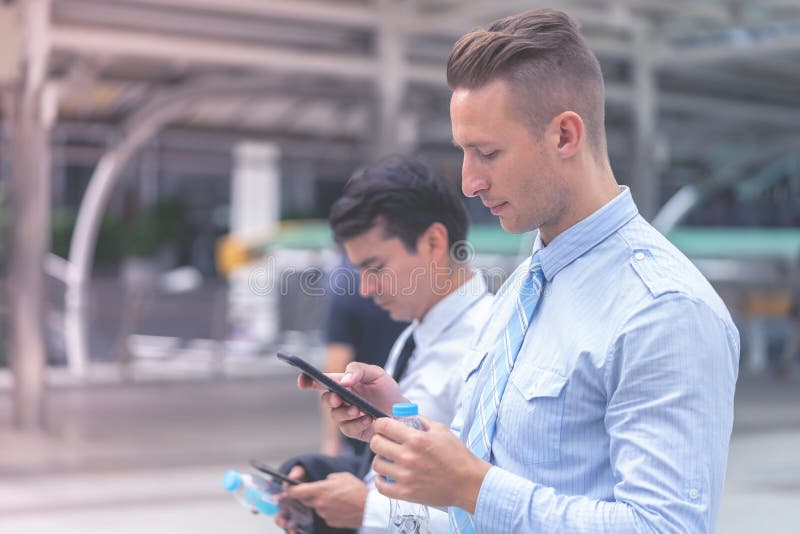 Business Man Taking a Break on Mobile Phone Stock Photo - Image of ... Business Man Taking a Break on Mobile Phone Stock Photo - Image of ...