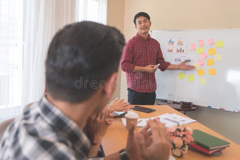 Business Man Training Office Worker on Whiteboard Stock Photo - Image ...