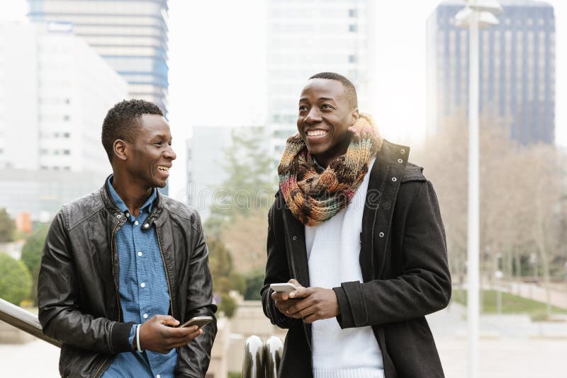 Business Men Using Mobile in the Street. Stock Photo - Image of ...