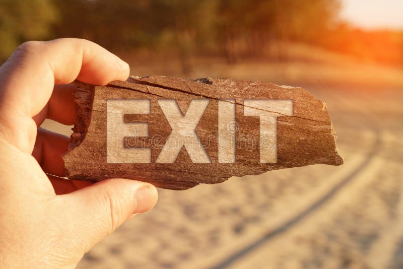 A Man Holds a Sign in His Hands - EXIT Stock Image - Image of marketing ...