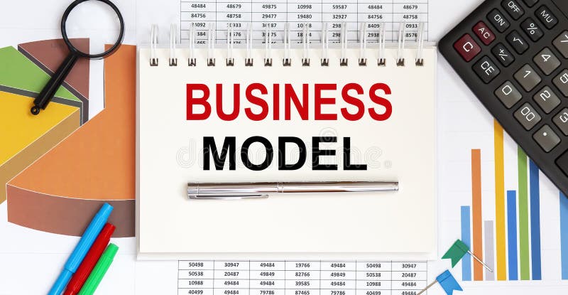 Business Model Text Written on a Notebook with Office Tools and Chart ...