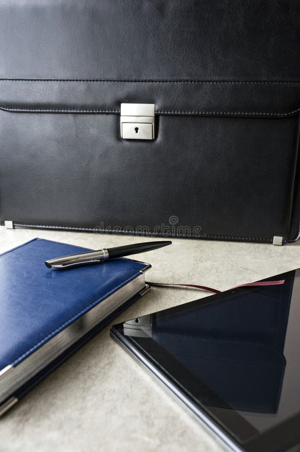 Business Notebook, Pen and Tablet on the Table in Front of the ...