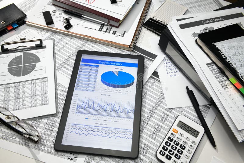 Business Office Desk Closeup - Tablet Computer with Tables and Graphs ...