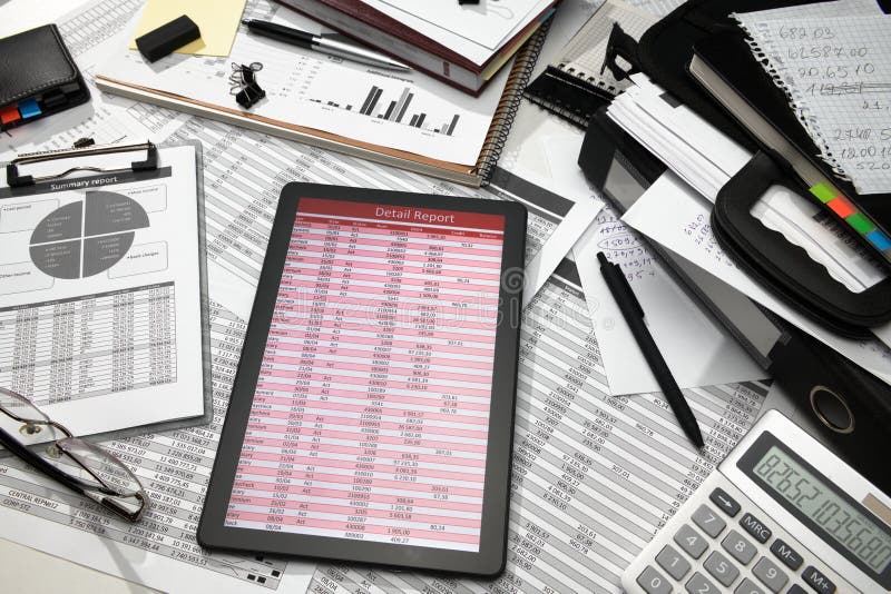 Business Office Desk Closeup - Tablet Computer with Tables and Graphs ...
