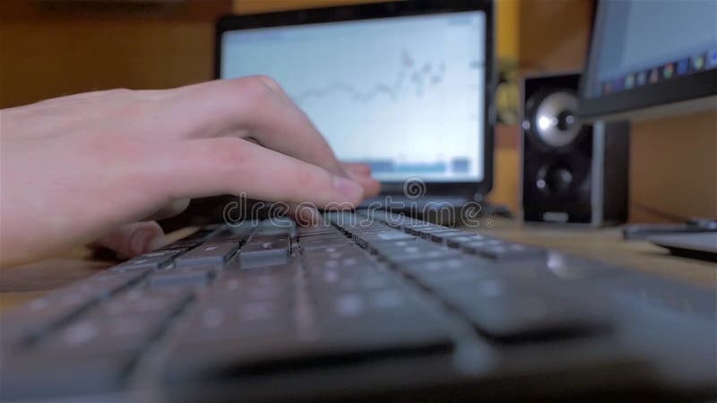 Business Office Low Angle Close-up of Hands Tapping on Black Computer ...