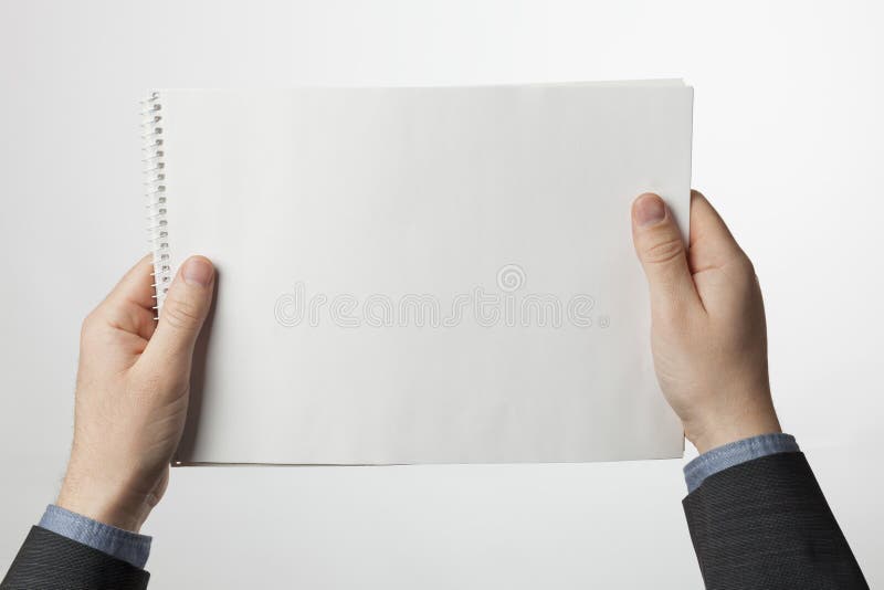 Business A4 Paper Notepad in Businessman Hands. Empty White Page of ...