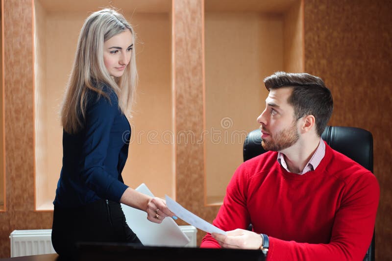Business Partner Sitting at the Table in Front of a Compute. Stock ...