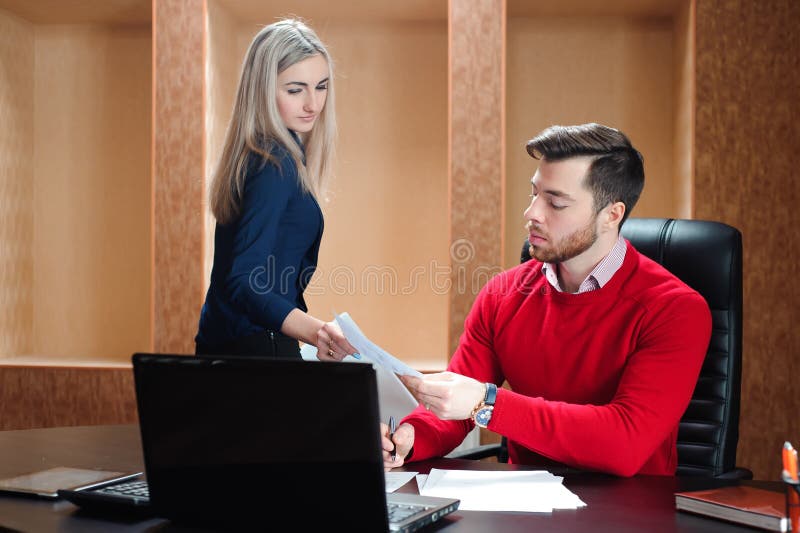 Business Partner Sitting at the Table in Front of a Compute Stock Image ...