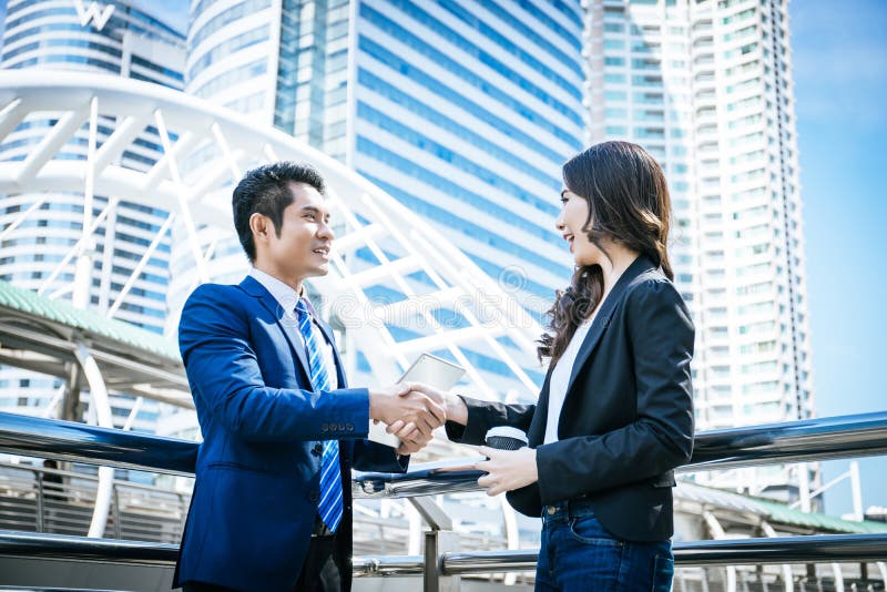 Business Partner Work Hands Shaking while Looking at Successful Work at ...