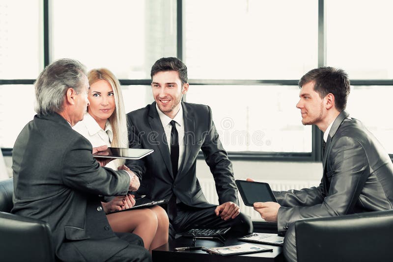 Business Partners Approving the Transaction with a Handshake Stock ...