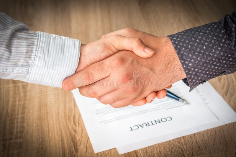 Partners Handshaking After Sign Business Contract Stock Image - Image ...
