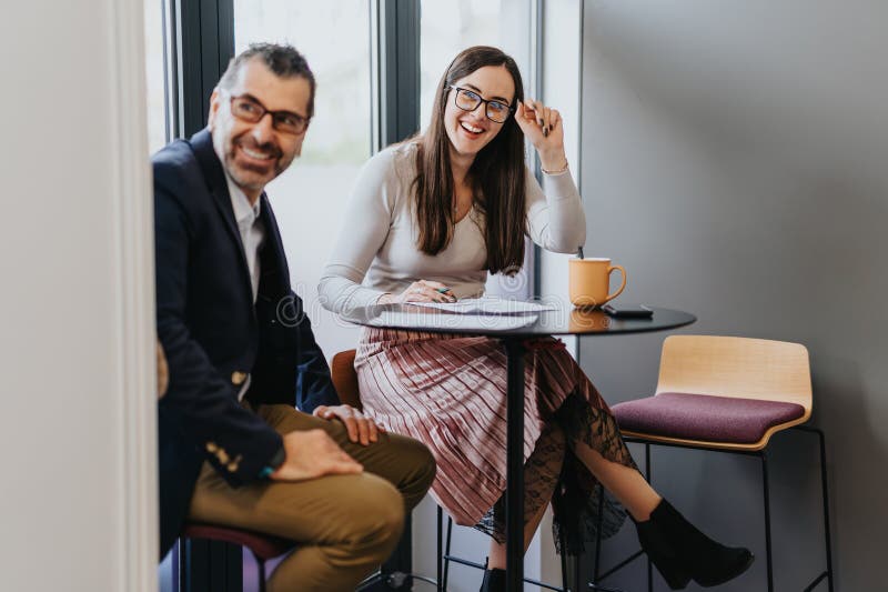 Business Partners Having Fun Conversation with Their Employees during ...