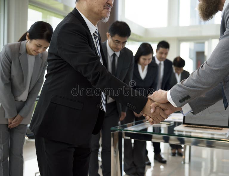Business Partners Introduction Handshake Bow Concept Stock Photo ...