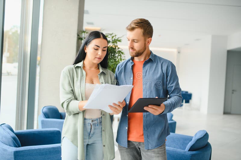 Business Partners Meeting in Office Lobby Stock Image - Image of ...