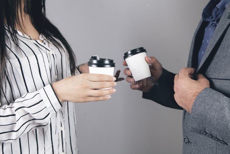 Business Partners are Standing with a Cup of Coffee Stock Photo - Image ...