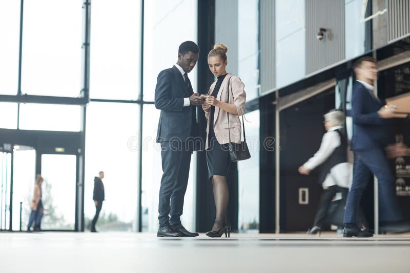 Business Partners Using Phones Stock Photo - Image of partnership ...