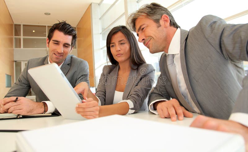 Business partners at work stock photo. Image of office - 21682276