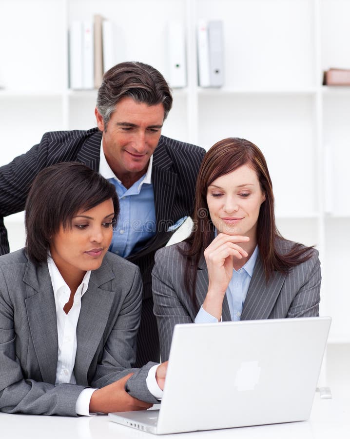 Business Partners Working at a Computer Together Stock Image - Image of ...