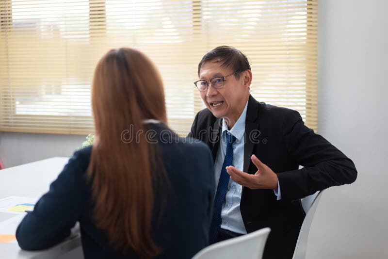 Business Partnership Concept, Senior in Business is Explaining and ...