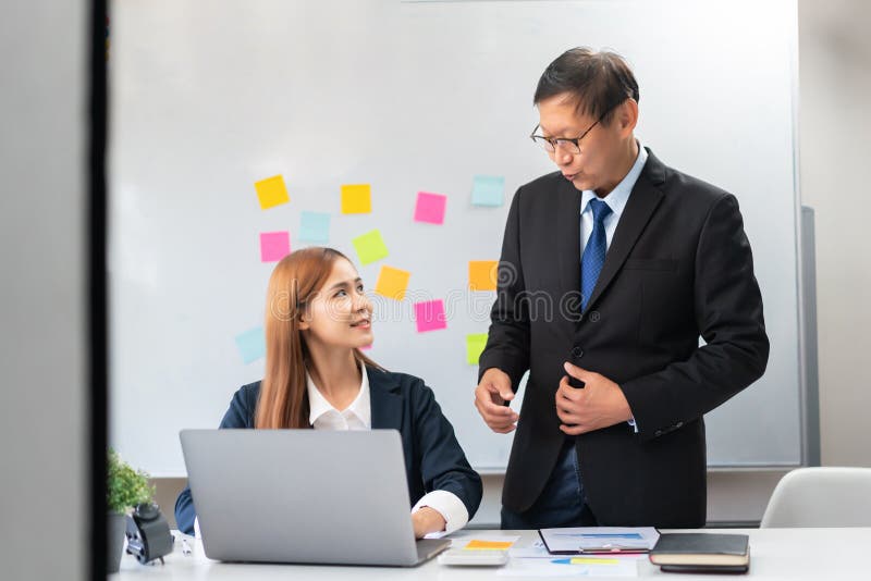 Business Partnership Concept, Senior in Business is Explaining Project ...