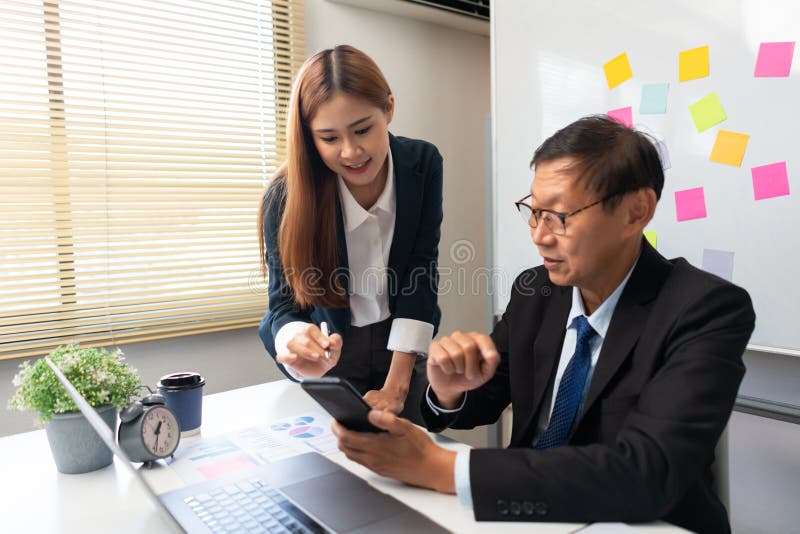 Business Partnership Concept, Business Senior Read Data on Smartphone ...