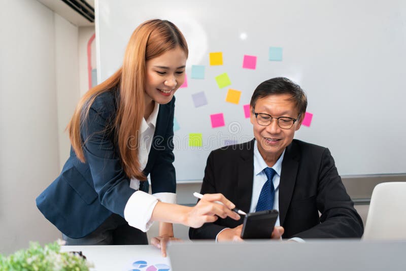 Business Partnership Concept, Business Senior Read Data on Smartphone ...