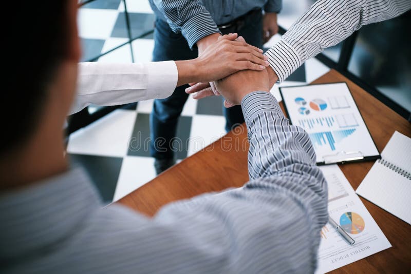 Business Partnership Putting Hands Together. Stock Image - Image of ...