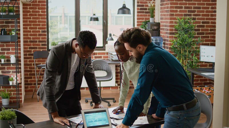 Business People Analyzing Charts Information on Documents Stock Image ...