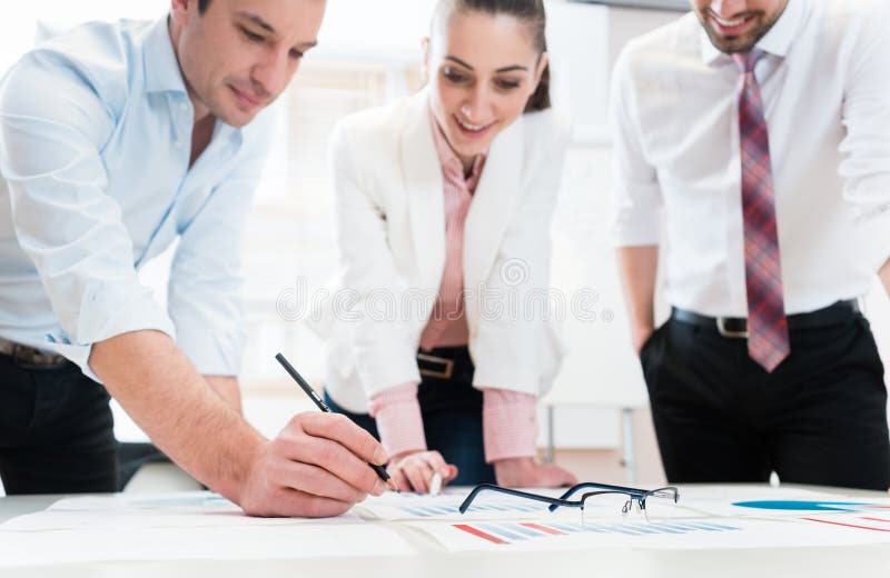 Business People Analyzing Data - Glasses on Graph Stock Photo - Image ...