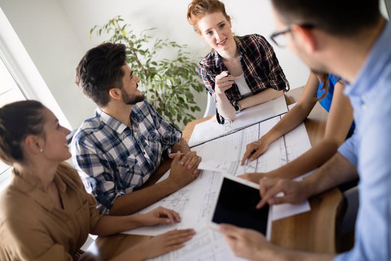 Business People and Architects Collaborating on Project Stock Photo ...