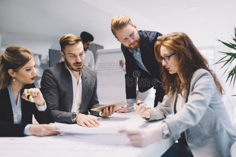 Business People and Architects Collaborating on Project Stock Photo ...