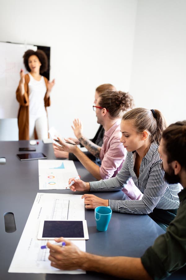 Business People, Architects Having Discussion and Working in Office ...