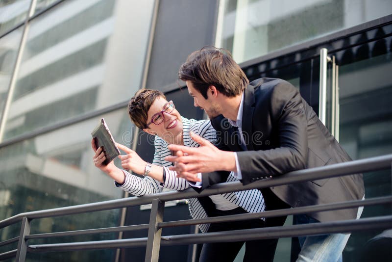 Business people on balcony stock photo. Image of cheerful - 90274598