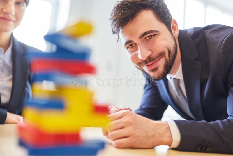 Business People with Building Blocks in Team Building Stock Image ...