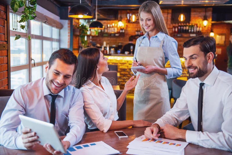 Business people in cafe stock photo. Image of executive - 289922306